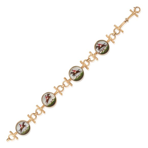 Bonhams Skinner : SLOAN & CO.: A RETRO 14K GOLD AND REVERSE PAINTED ...
