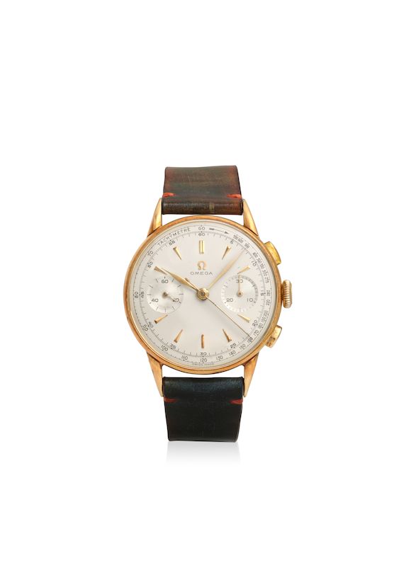 Bonhams : OMEGA. A 14K GOLD MANUAL WIND CHRONOGRAPH WRISTWATCHRef: 2404 ...