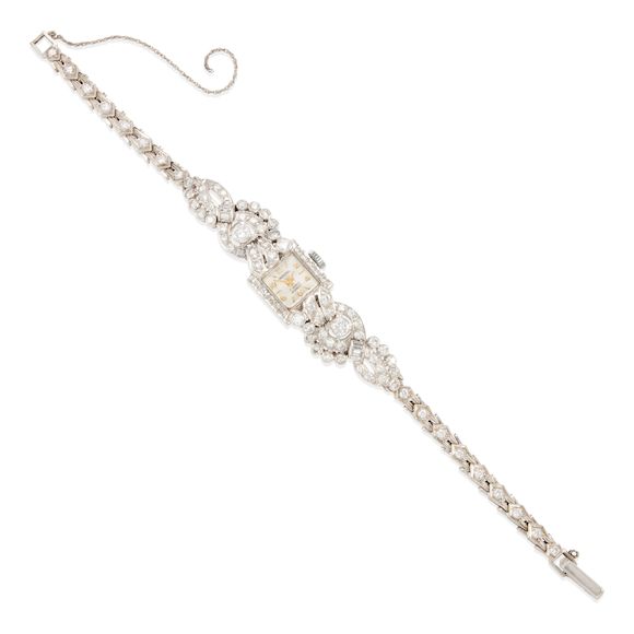 Bonhams : IMPERIAL: PLATINUM, 14K WHITE GOLD AND DIAMOND WRISTWATCH
