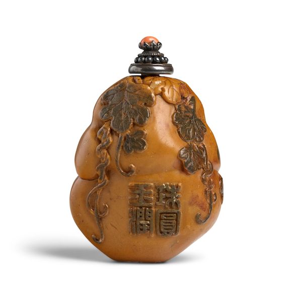 Bonhams : AN UNUSUAL INSCRIBED GREEN AND OCHRE SOAPSTONE GOURD-FORM ...