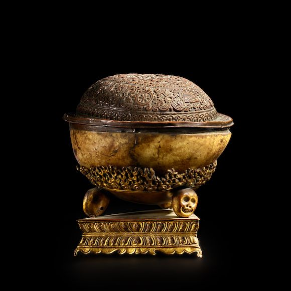 Bonhams : A BONE KAPALA WITH COPPER COVER AND GILT COPPER ALLOY STAND ...